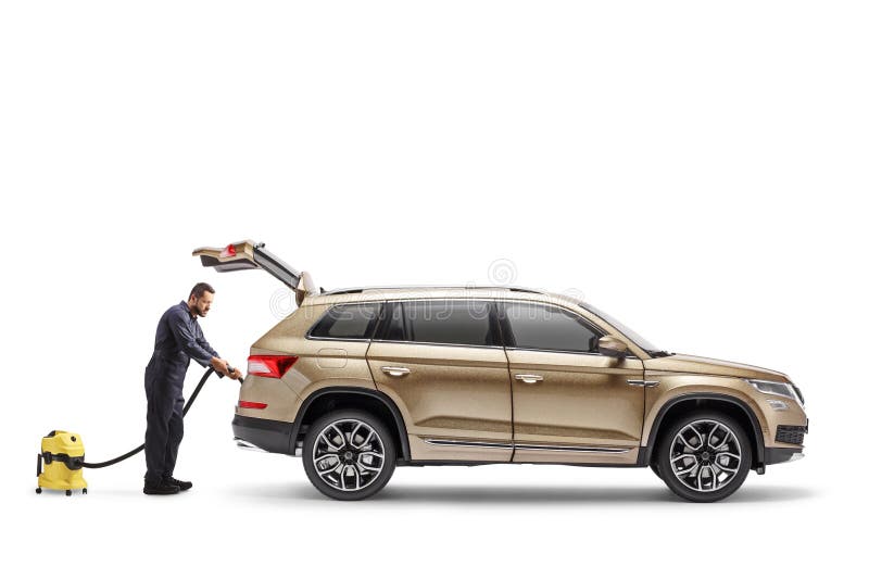 Worker Cleaning a SUV with a Vacuum Cleaner Stock Photo - Image of ...
