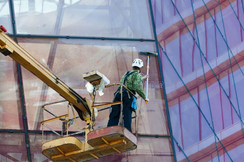 Worker Cleaning Windows On Height Stock Image - Image of exterior ...