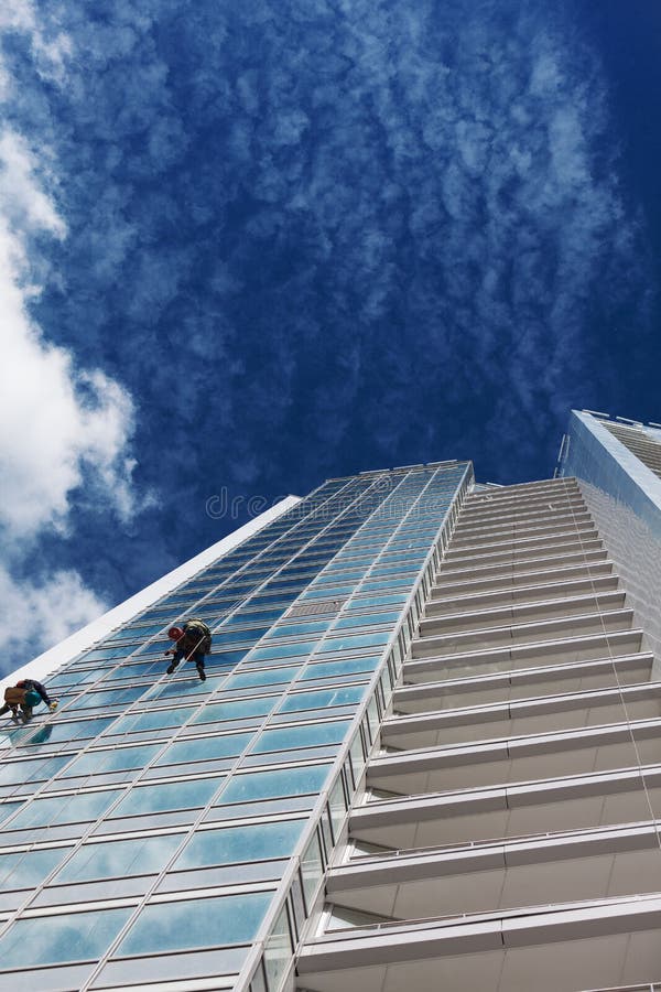 Worker Cleaning Windows on Height Stock Photo - Image of protection ...