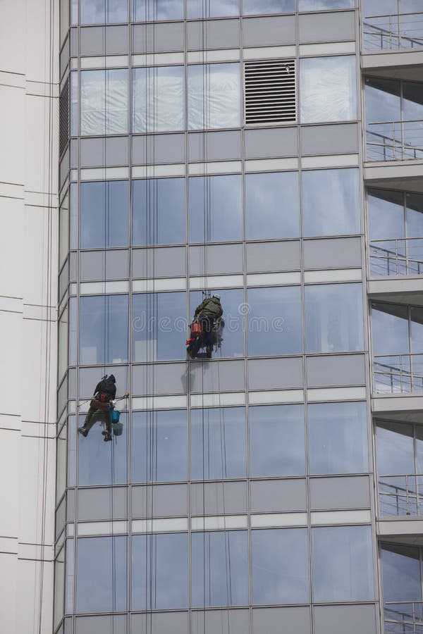 Worker Cleaning Windows on Height Stock Photo - Image of frame, rise ...