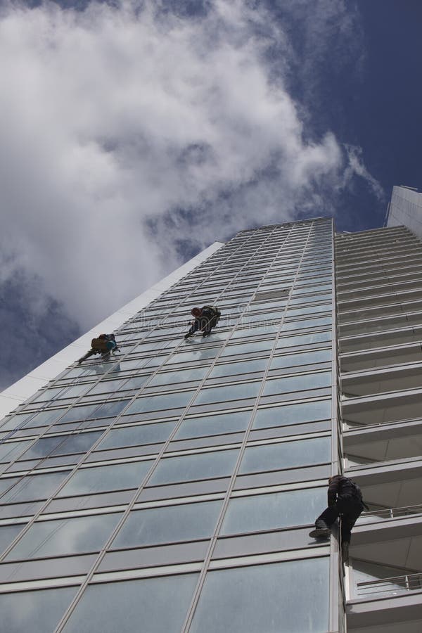 Worker Cleaning Windows on Height Editorial Photography - Image of ...