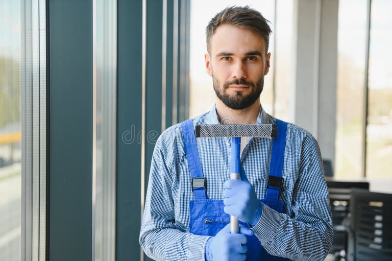 Worker Cleaning Windows Service on High Rise Building Stock Photo ...