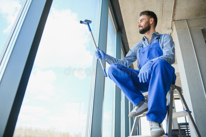 Worker Cleaning Windows Service on High Rise Building Stock Image ...