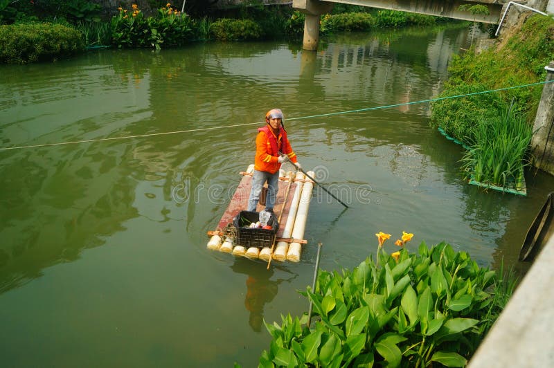 Shenzhen, China: Workers Clean Up Plastic Waste on a River Editorial ...