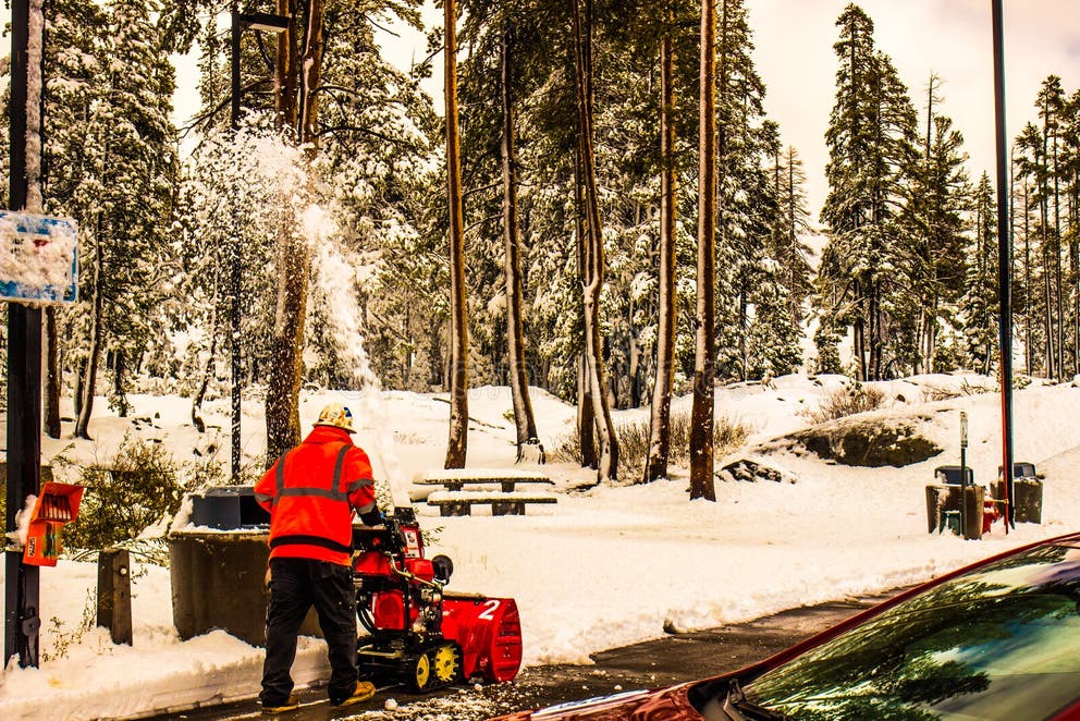 Worker Clearing Snow at Rest Area Stock Image - Image of highway, blow ...