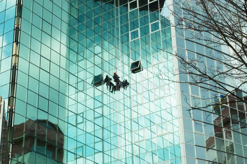 Worker Climbing at Mirror Wall Stock Photo - Image of high ...