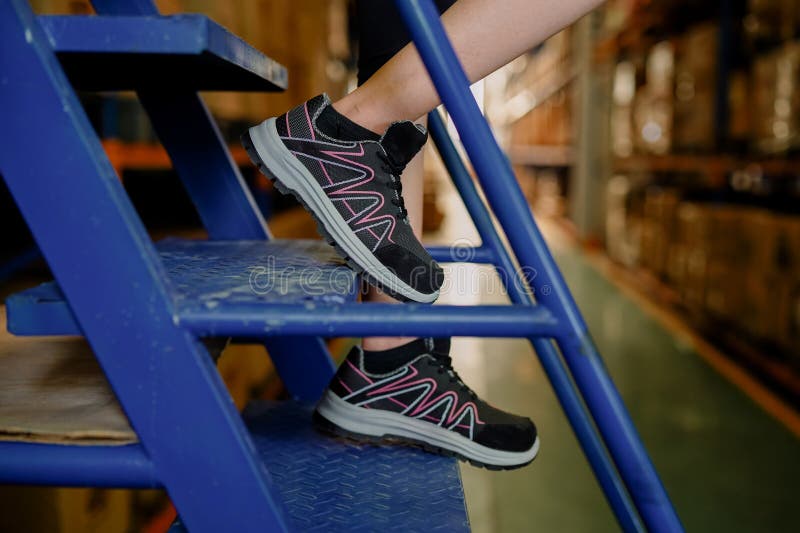 The Workers are Climbing the Stairs Wearing Safety Shoes Made of ...