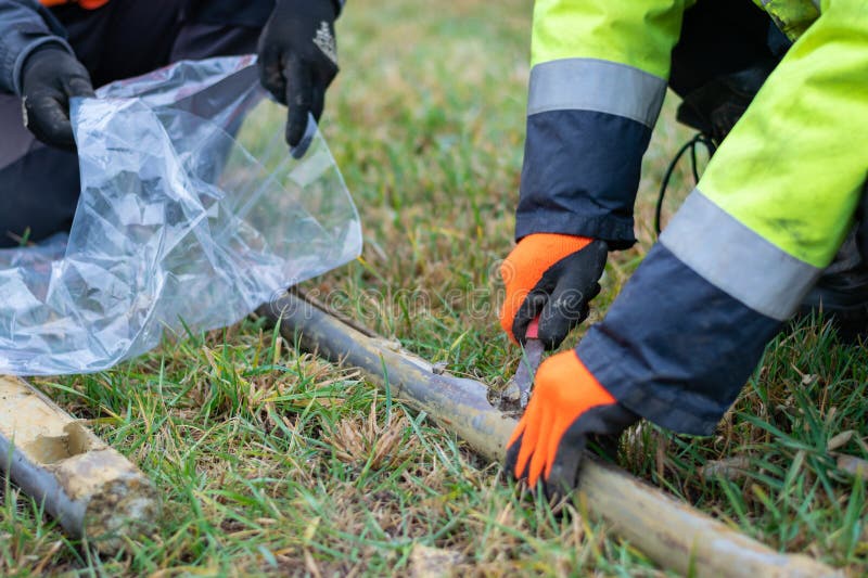 Worker Collects Soil Sample from Core Drill Stock Photo - Image of ...