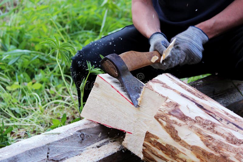 The Worker Collects a Wooden Frame with the Help of an Hacket during ...