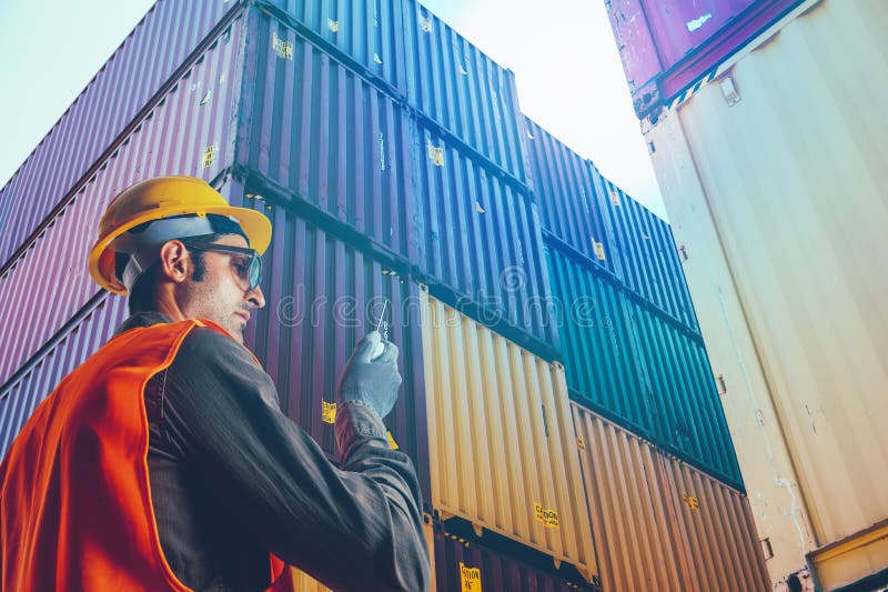 Worker Communicate Using Radio To Control Loading Containers at Port ...