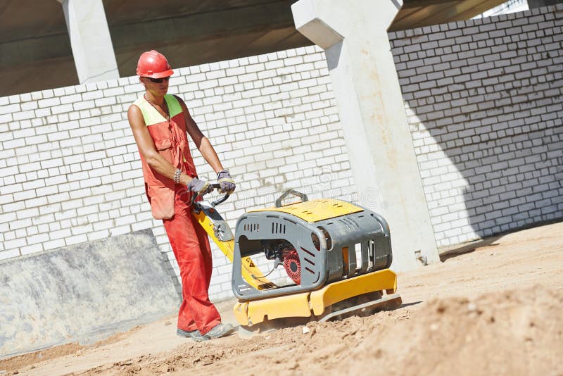 Worker with Compaction Machine Stock Photo - Image of craftsperson ...
