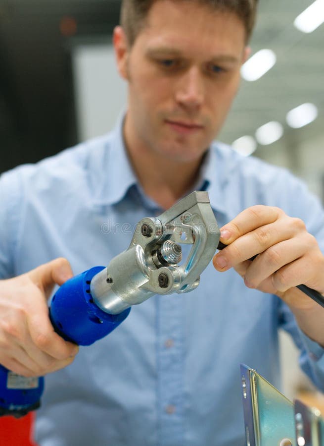 Worker Compressing Cable Connector. Stock Image - Image of factory ...