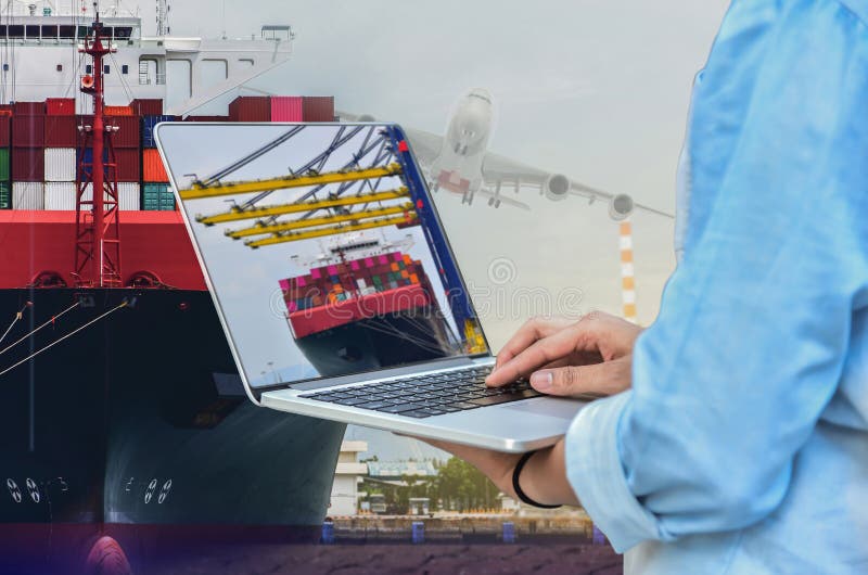 Workers with Computer Note Book in Port during Cargo Ship Loading Stock ...