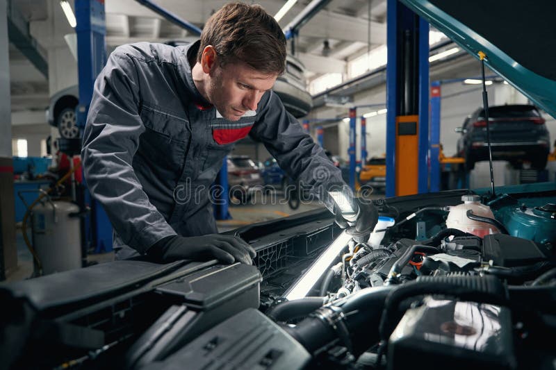 Worker Conducts Full Technical Check of Auto Stock Photo - Image of ...