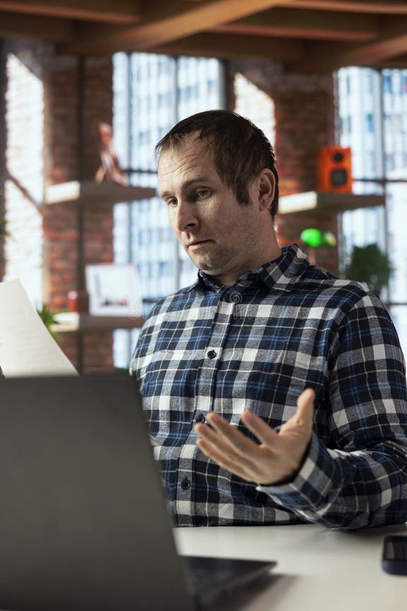 Worker Confused by Missing Data in Documents, Comparing with Laptop ...