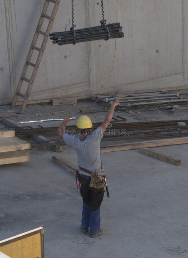 Worker with Construction Crane with Heavy Load Stock Image - Image of ...
