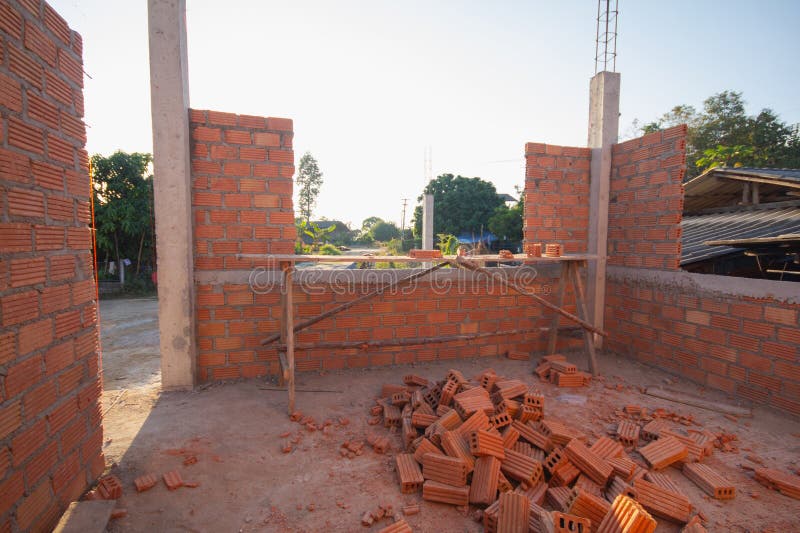 Worker Construction Single Family Brick House in Suburban Area Using ...