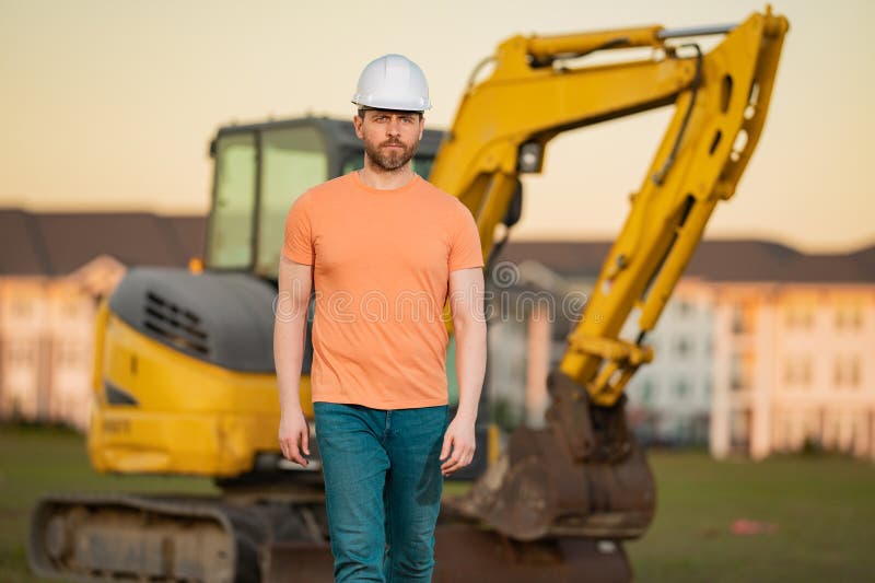 Worker at Construction Site. Builder Constructor in Hardhat ...