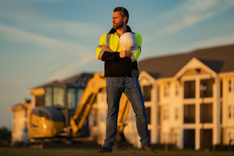 Worker at Construction Site. Builder Constructor in Hardhat ...