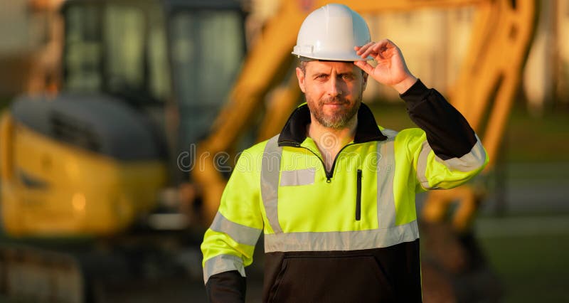 Worker at Construction Site. Builder Constructor in Hardhat ...