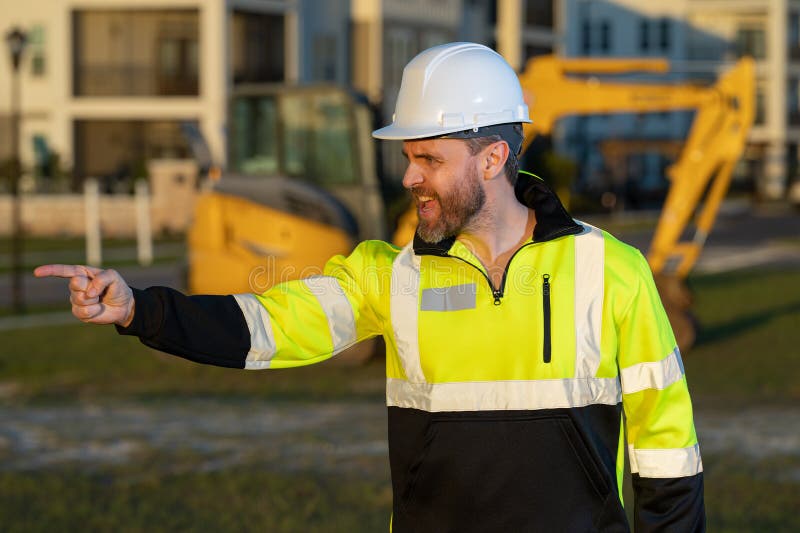 Worker at Construction Site. Builder in Hardhat. Construction Man with ...