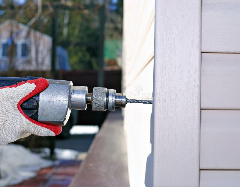 Worker at Construction Site Drills Wall Drilling Machine Stock Image ...