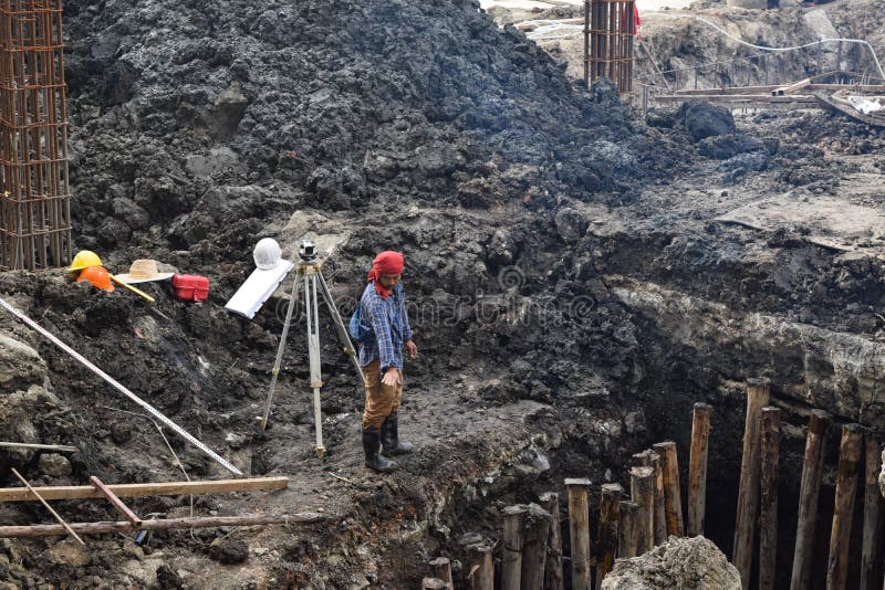 Worker on Construction Site Looking at the Stumps Editorial Stock Image ...