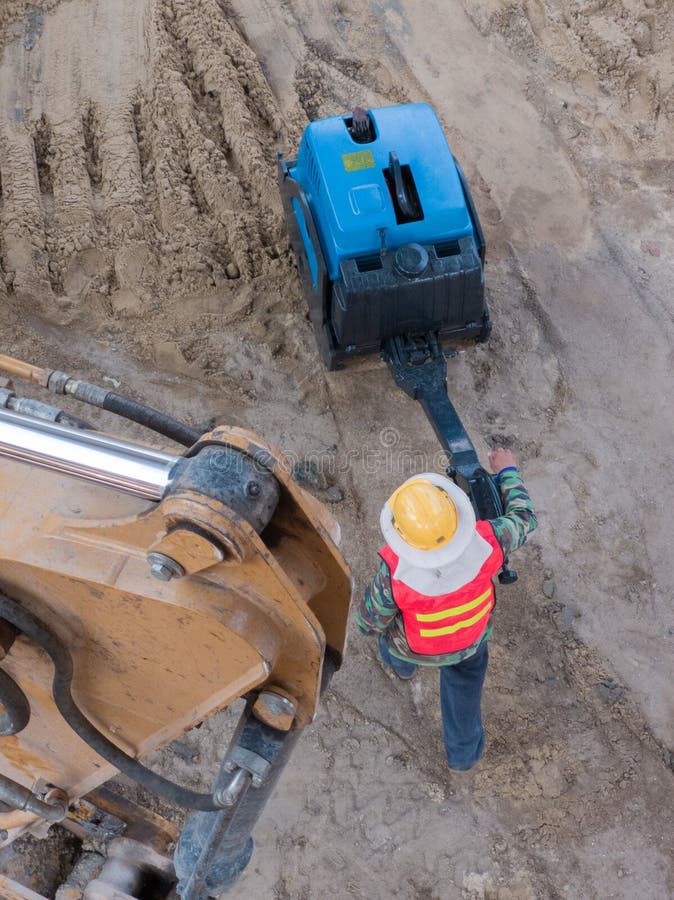Worker at Construction Site Stock Image - Image of foundation, floor ...