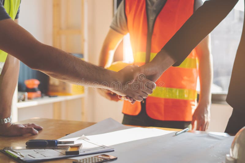 Worker and Contractor. Client Shaking Hands with Team Builder in ...