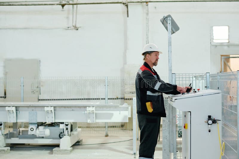 Worker Controlling the Work at Machine Stock Photo - Image of work ...