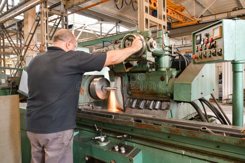 The Worker Controls the Feed of the Grinding Wheel when Grinding the ...