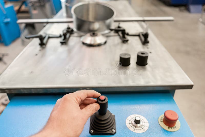 Worker Controls the Machine. Production Rolling Tool, Electric Machine ...