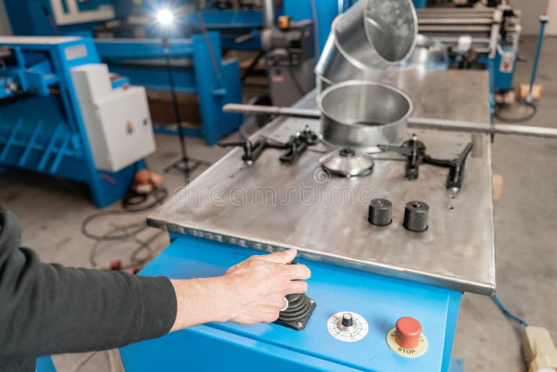 Worker Controls the Machine. Production Rolling Tool, Electric Machine ...