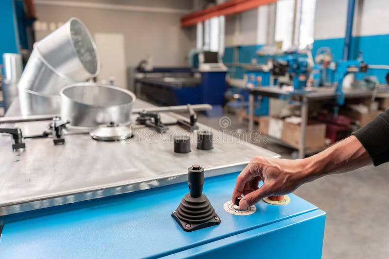 Worker Controls the Machine. Production Rolling Tool, Electric Machine ...