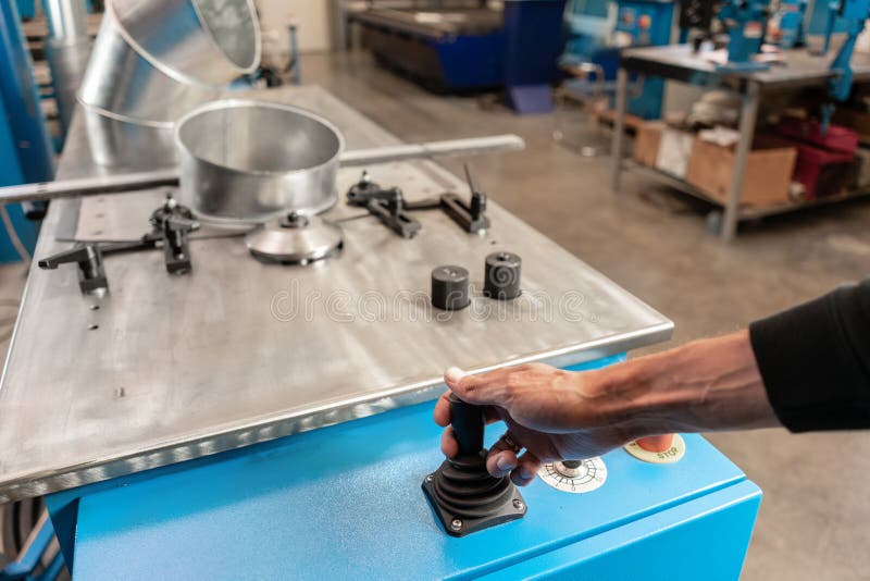 Worker Controls the Machine. Production Rolling Tool, Electric Machine ...