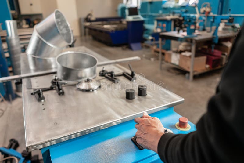 Worker Controls the Machine. Production Rolling Tool, Electric Machine ...