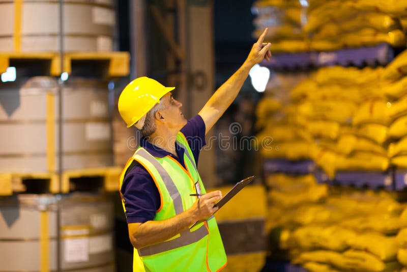 Worker Counting Stocks in Warehouse Stock Image - Image of audit ...