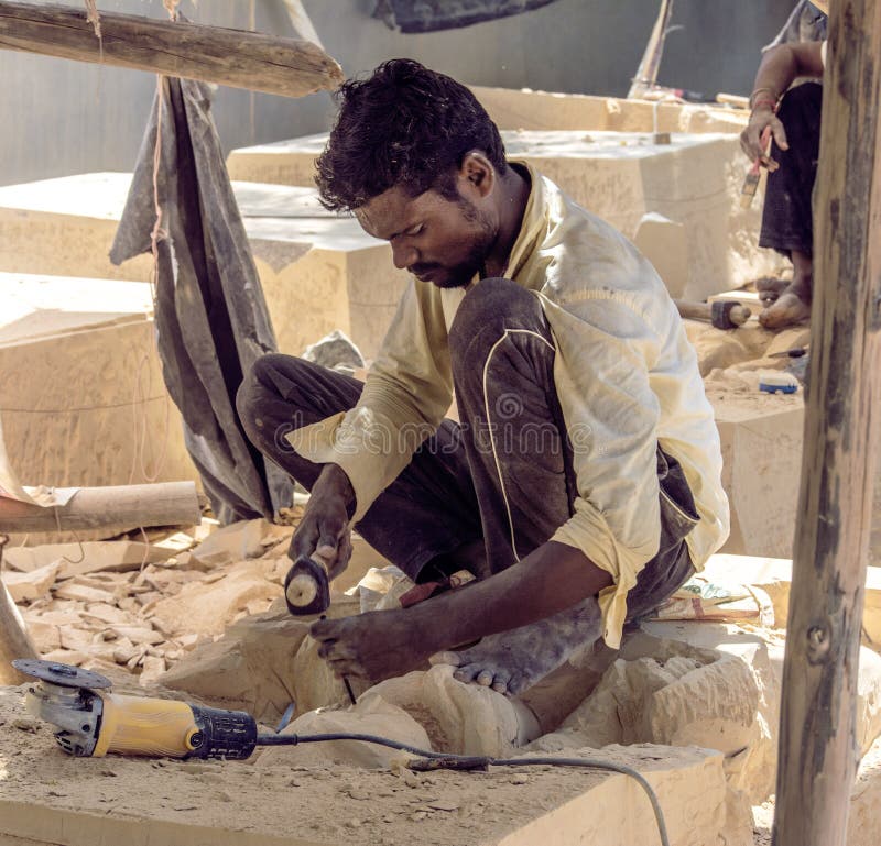 Worker crafting statue editorial photography. Image of male - 99056067