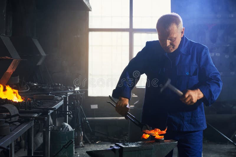 Worker Creating Beautiful Decorations for Modern Fence. Stock Photo ...