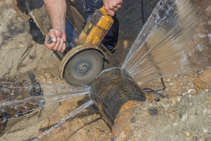 Worker Cut Section of Water Main Pipe 3 Stock Photo - Image of laid ...