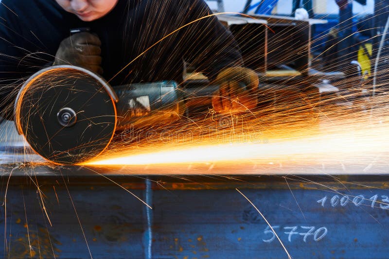 Worker Cuts Metal Beam with Abrasive Disk in Plant Workshop Stock Photo ...