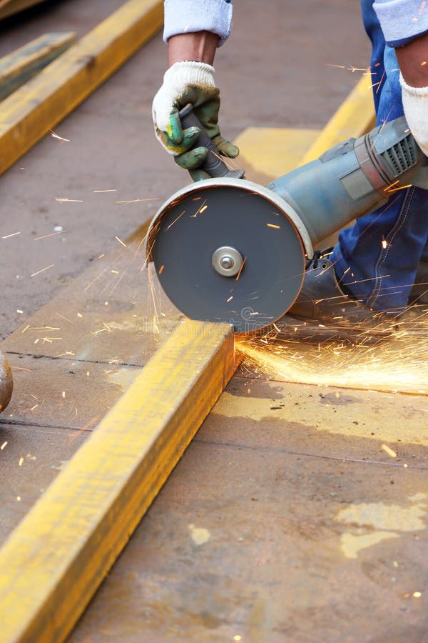 Worker cuts metal stock image. Image of heavy, working - 34255889