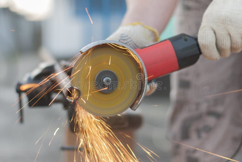 Worker cuts metal. stock photo. Image of equipment, heavy - 39819272