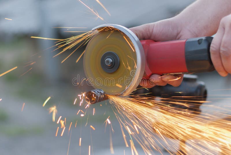 Worker cuts metal. stock image. Image of machine, hand - 39819281