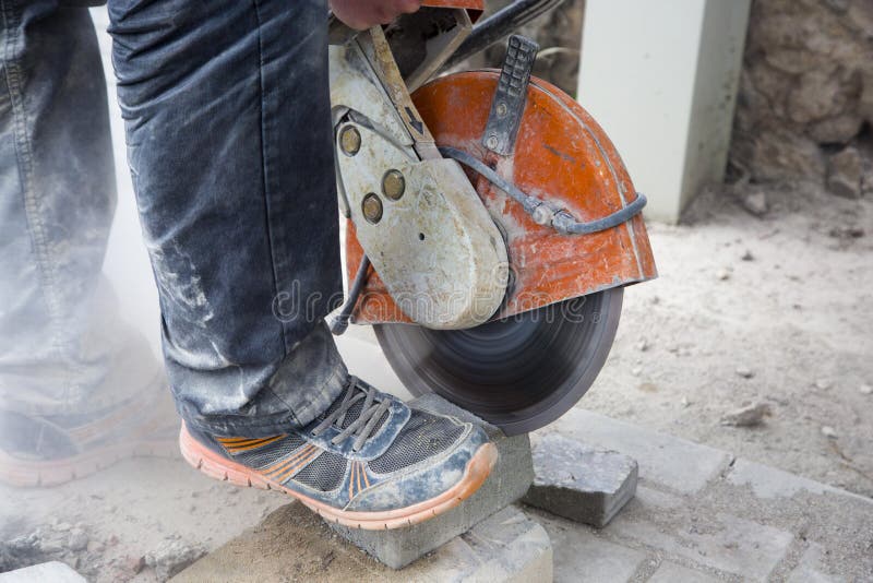 The worker with cutter stock photo. Image of city, dust - 42092940