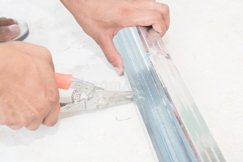 Worker cutting aluminium stock photo. Image of worker - 83533082