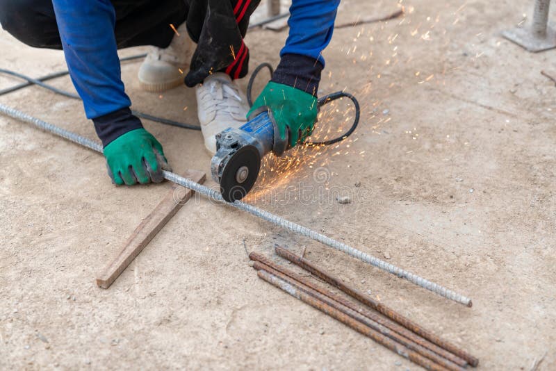 Worker Cutting Deformed Steel Bar Using Angle Grinder Stock Photo ...