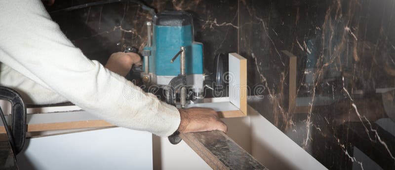 Worker Cutting Kitchen Countertop Using Electric Saw Stock Image ...