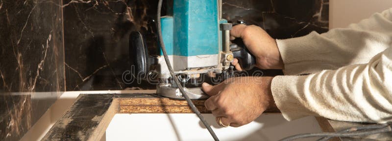 Worker Cutting Kitchen Countertop Using Electric Saw Stock Image ...