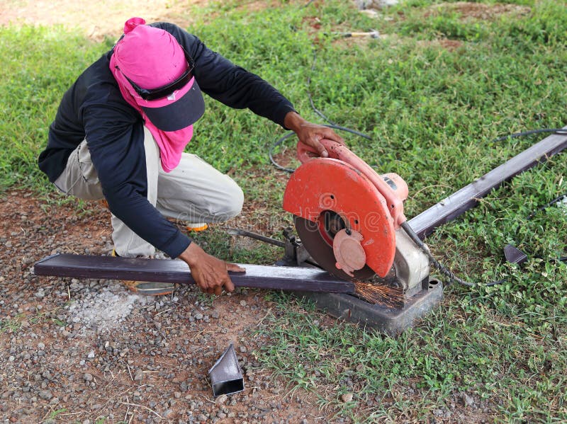 Worker Cutting Metal with Cutting Machine Stock Photo - Image of ...